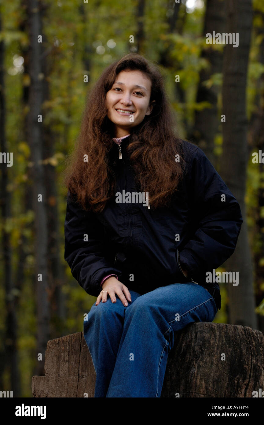 Happy smiling ethnic woman in autumn forest beauty in the nature Stock ...