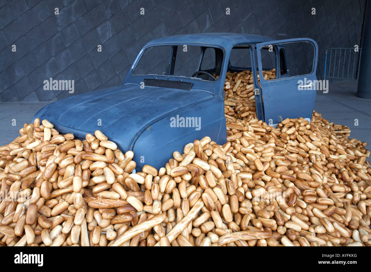 Old car filled with French bread on display in Rennes, Brittany, France ...