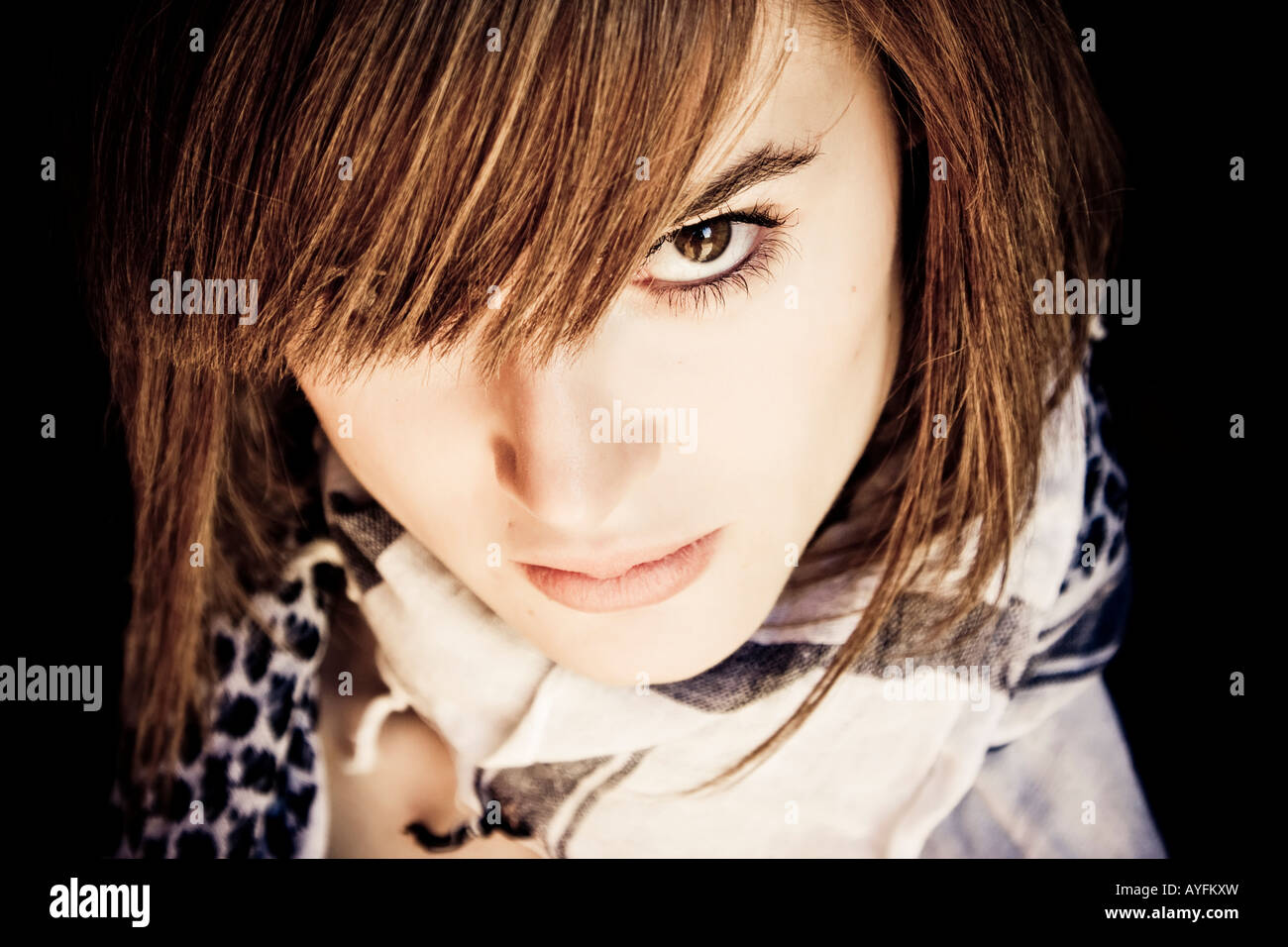 Serious young woman obscure portrait Stock Photo - Alamy
