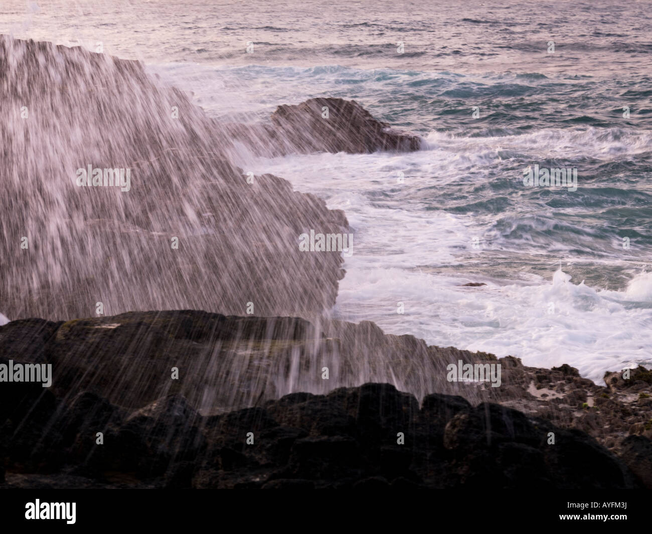 Water spray over the rocks, Kauai, Hawaii Stock Photo - Alamy