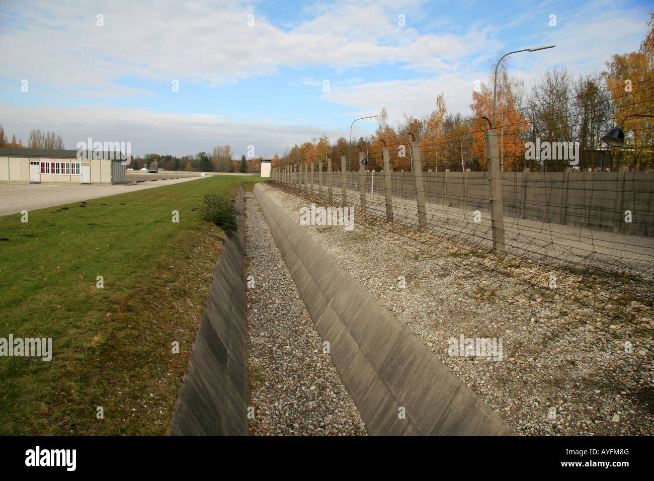 A maintained section of the barbed wire fencing around the former ...