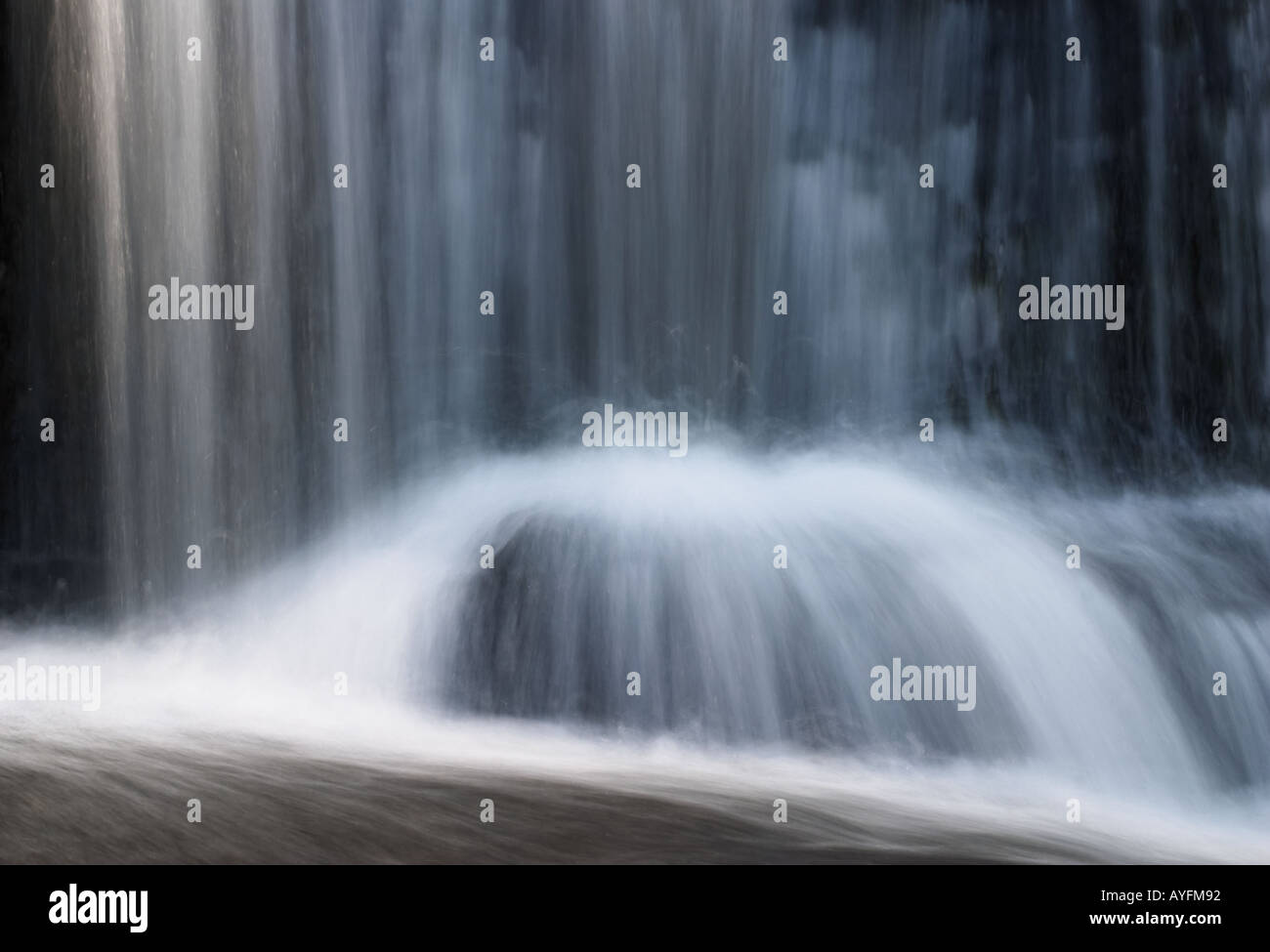 Waterfall hitting rock Stock Photo - Alamy