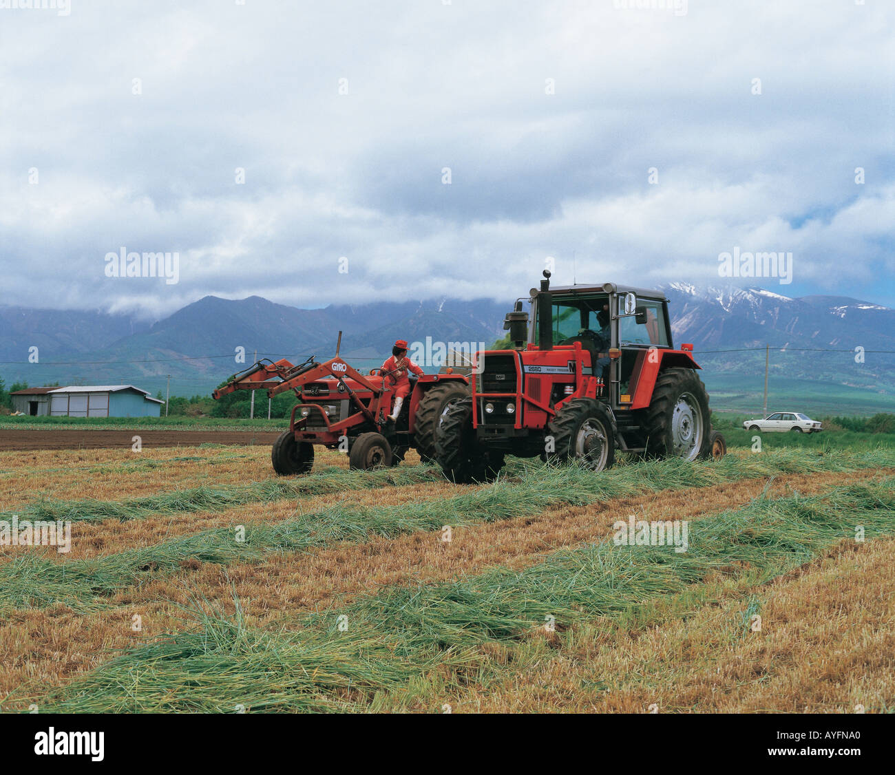 Tractor on Farm Stock Photo - Alamy