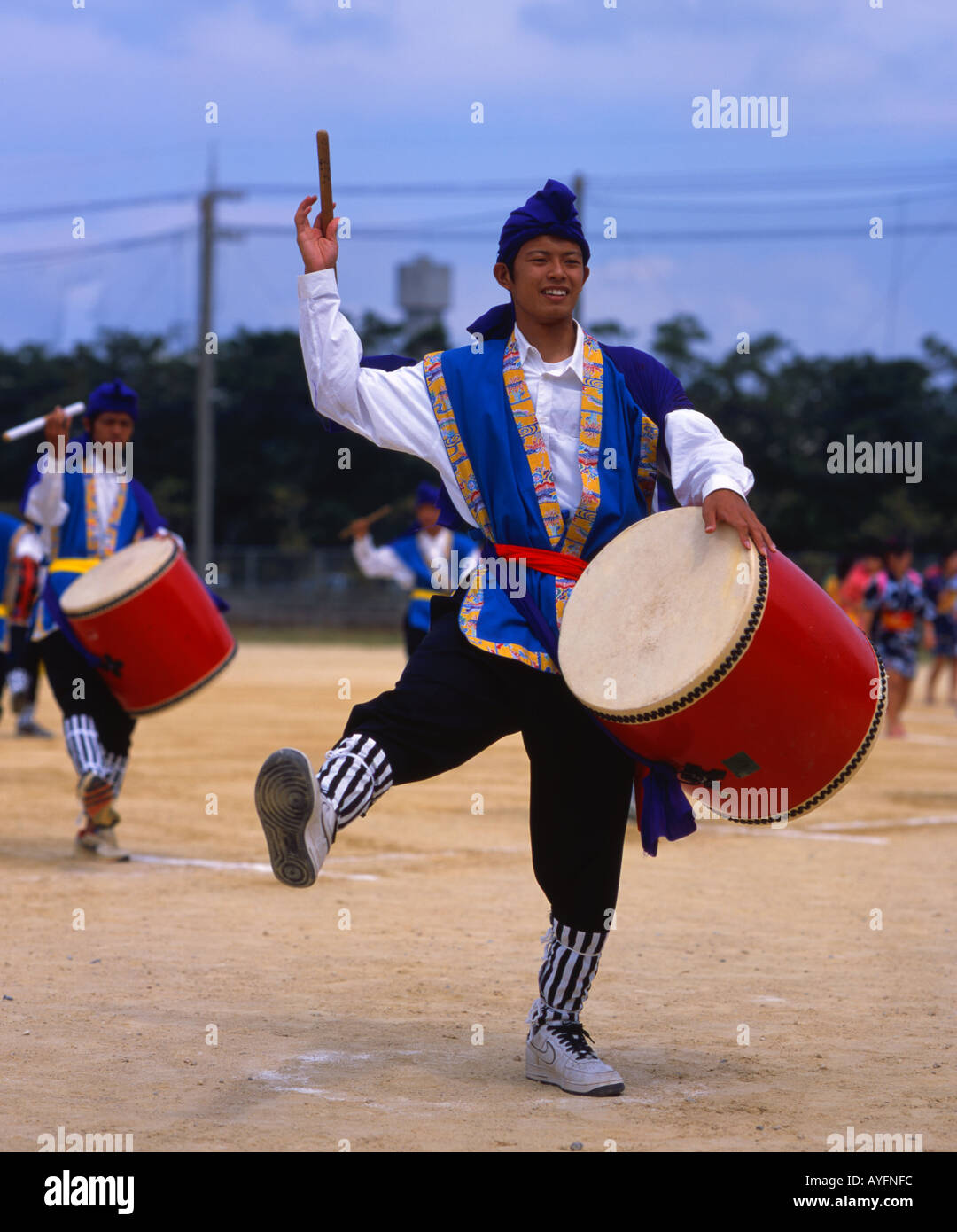 Japanese high school boy performa traditional eisa drumming at school ...