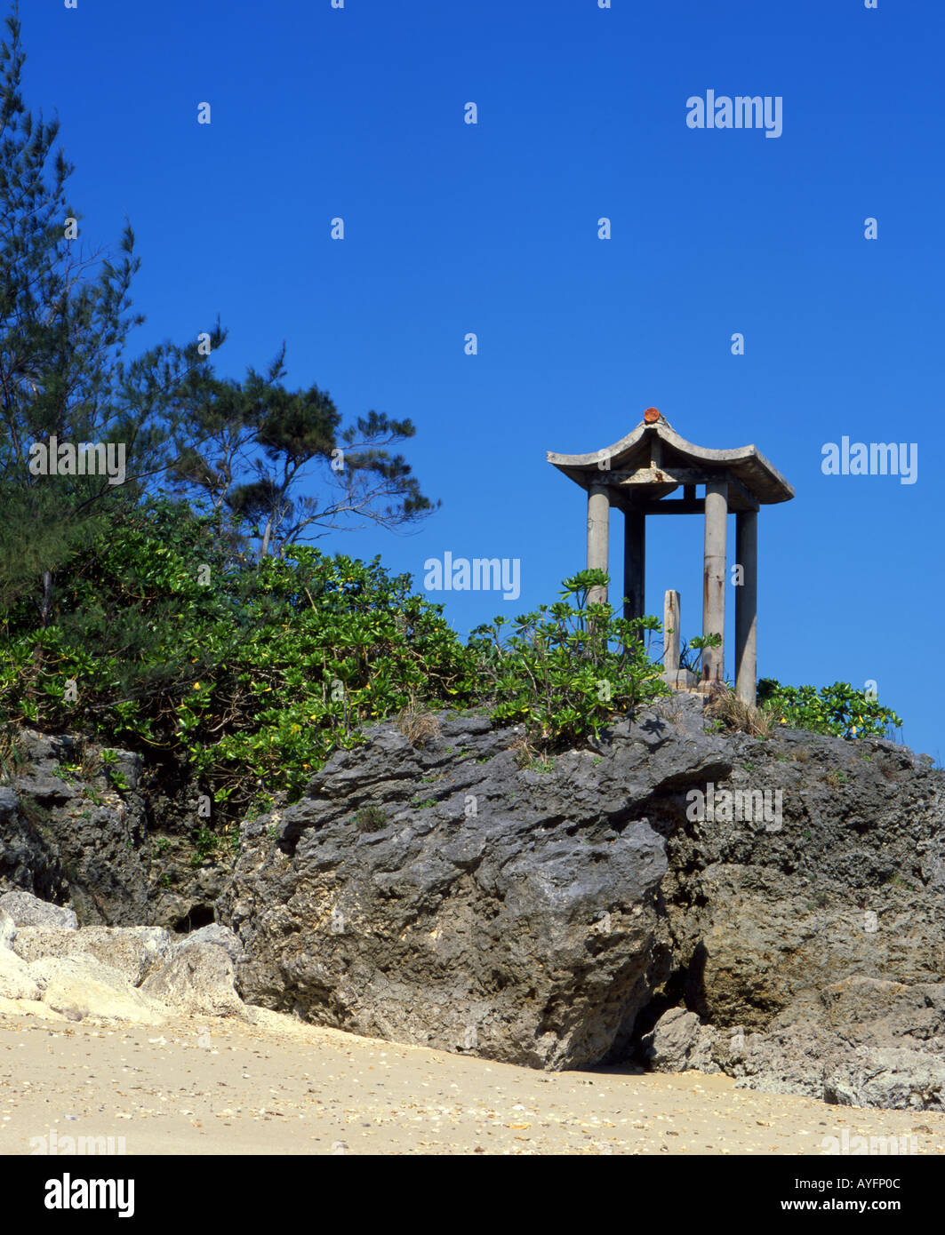Small shrine beside the beach overlooking the ocean in Okinawa, Japan ...