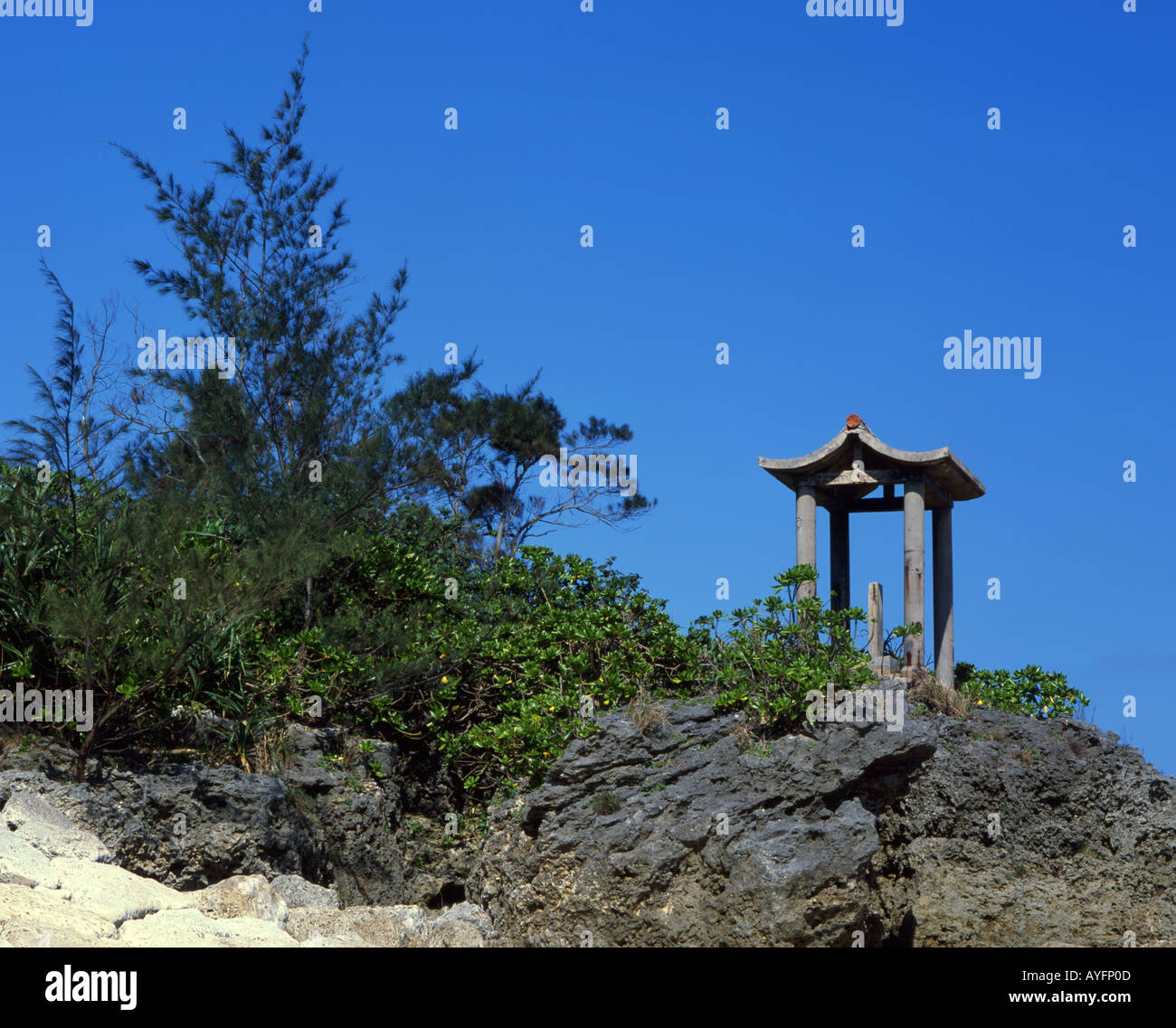 Small shrine beside the beach overlooking the ocean in Okinawa, Japan ...