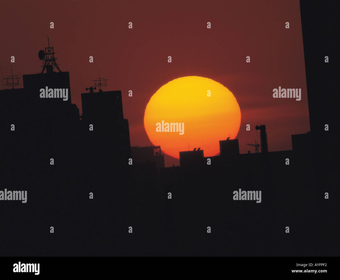 Sun with Building Stock Photo - Alamy