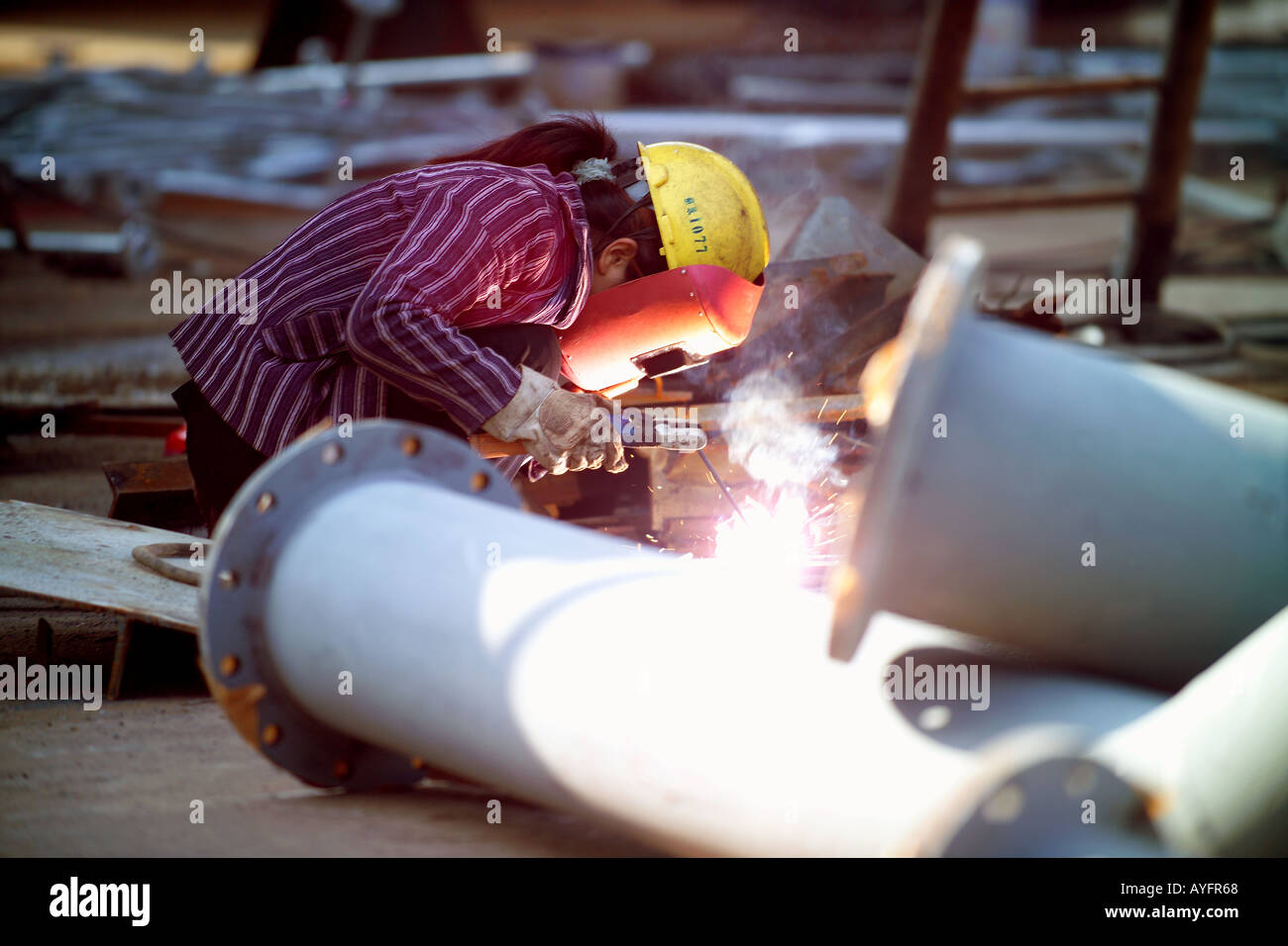 Welding worker china hi-res stock photography and images - Alamy