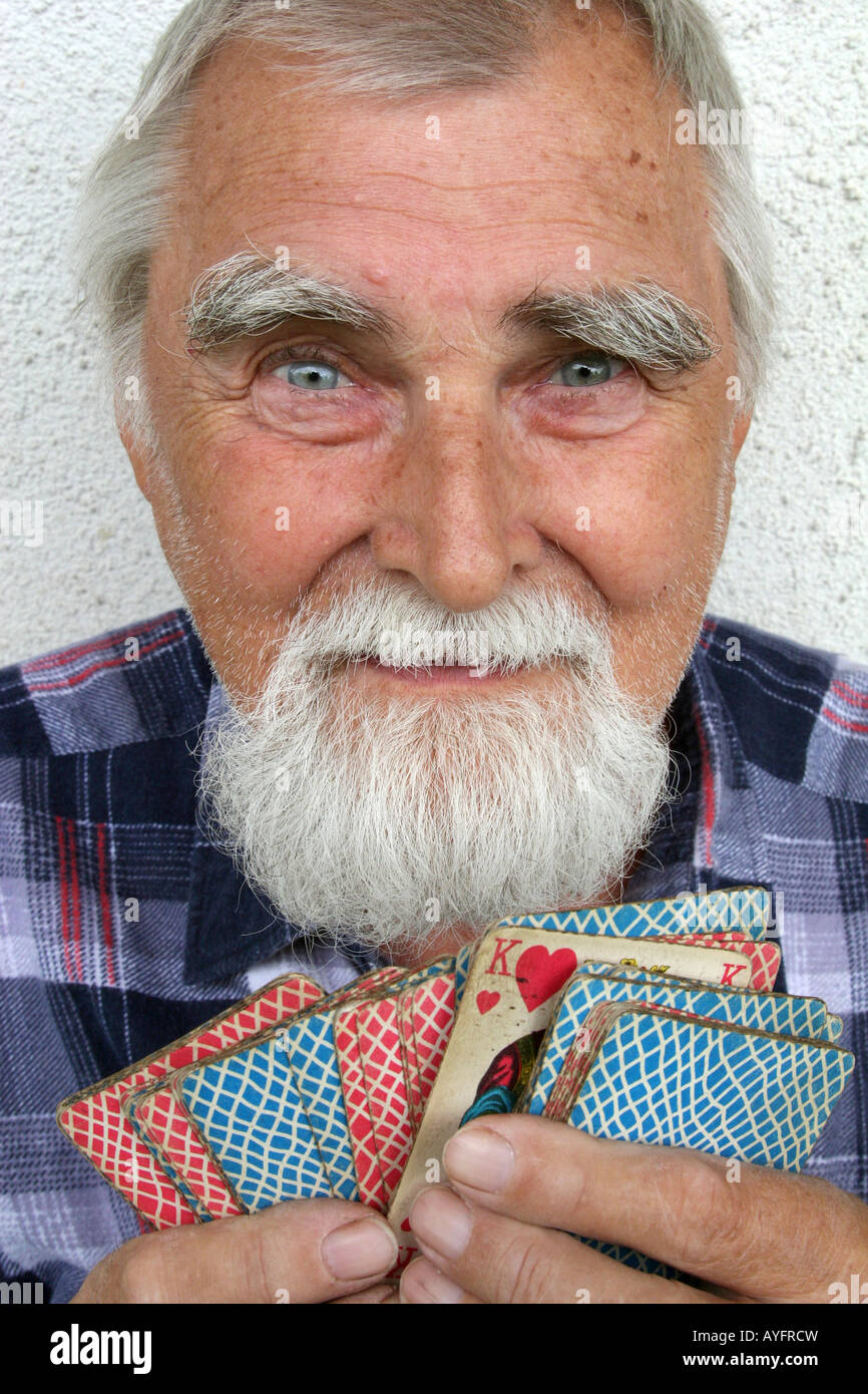 "man with playing cards Stock Photo - Alamy