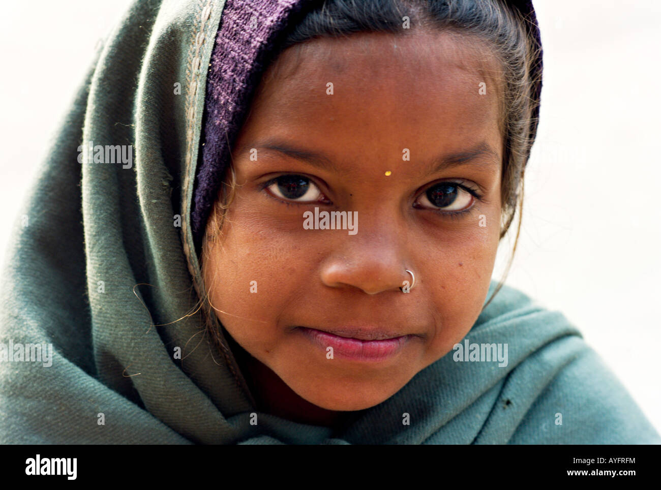 INDIA NEW DELHI Portrait of beautiful young girl living on the street ...