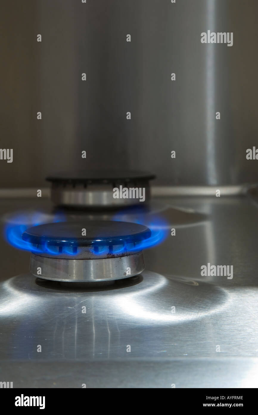 Gas flame on a kitchen hob Stock Photo - Alamy
