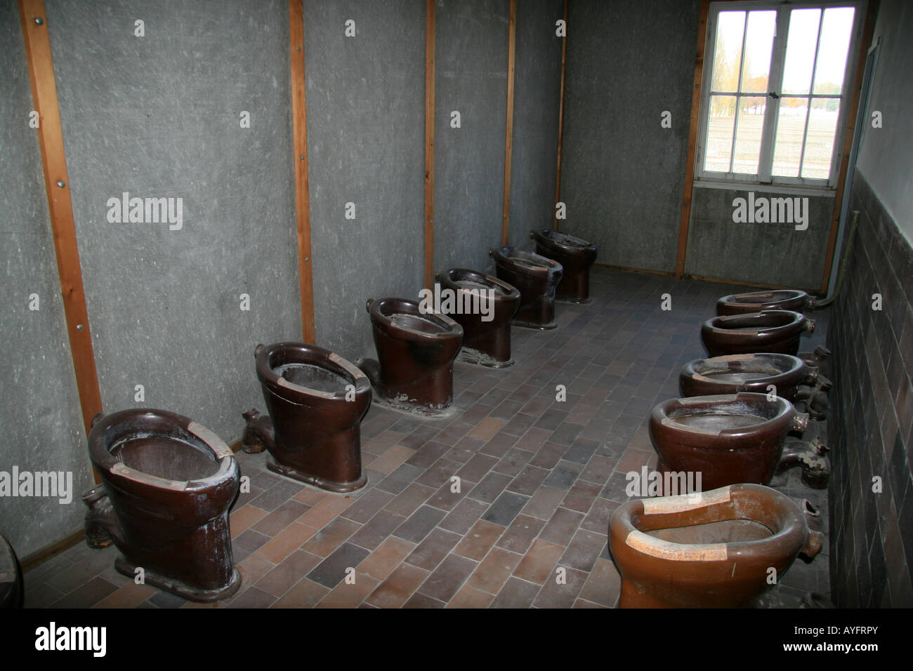 Inside a latrine room at the former German concentration camp at Dachau ...