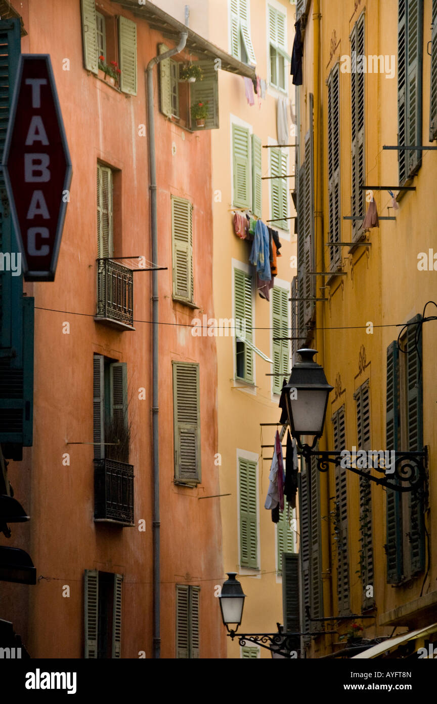 Windows and shutters of an old buildings in Nice, France Stock Photo ...