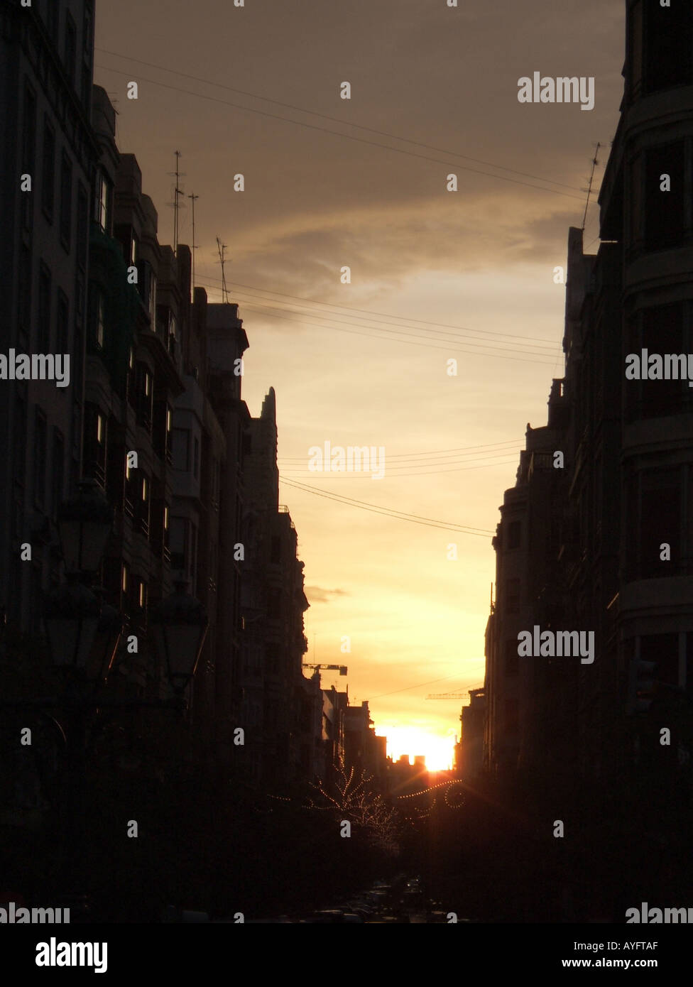 sunset over city skyline in valencia spain Stock Photo - Alamy