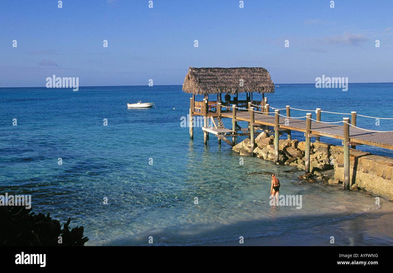 CARIBBEAN BAHAMAS ISLANDS NASSAU A beach and a thatched roof beach ...