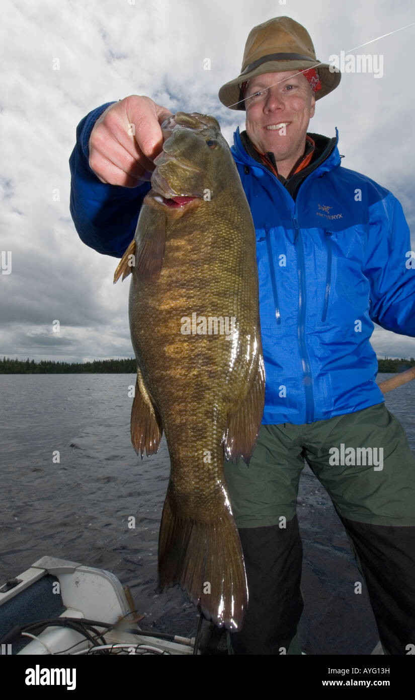 angler with smallmouth bass Stock Photo - Alamy