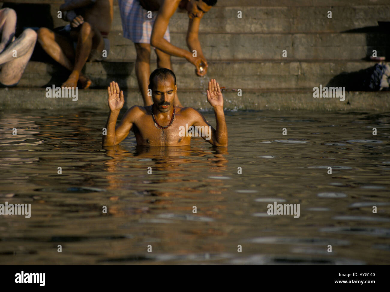 dawn prayers rver ganges Varanasi India Stock Photo - Alamy