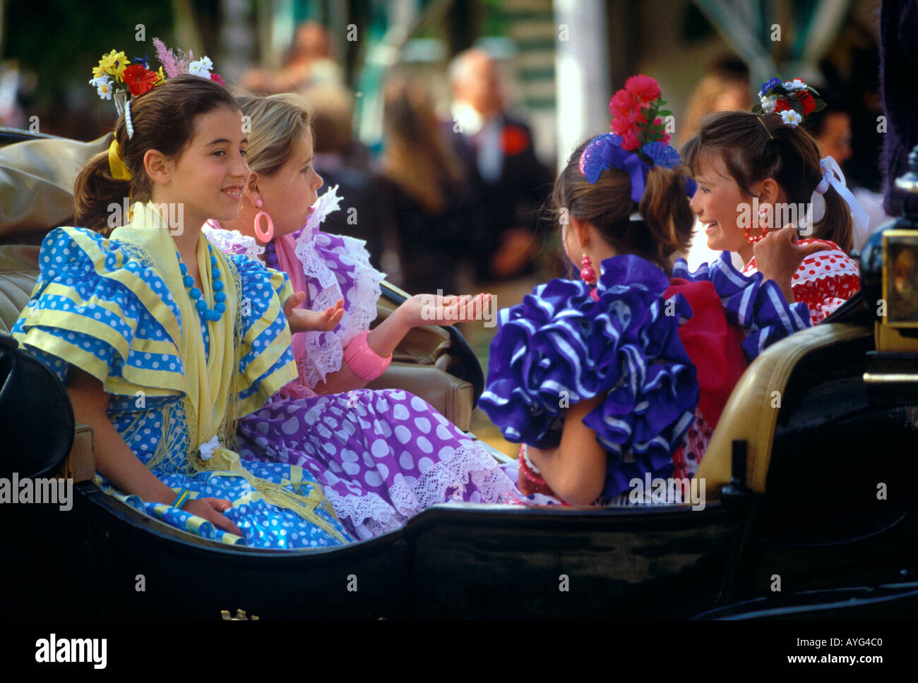 FOUR YOUNG GIRLS IN COSTUME DURING SEVILLA FAIR SPAIN Stock Photo - Alamy