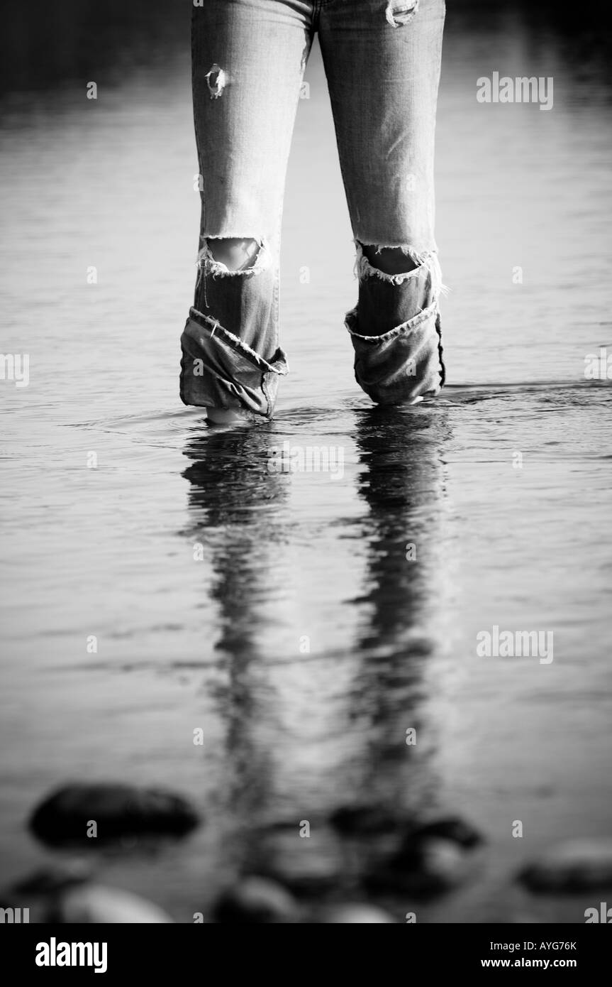 A person wades in the water Stock Photo - Alamy