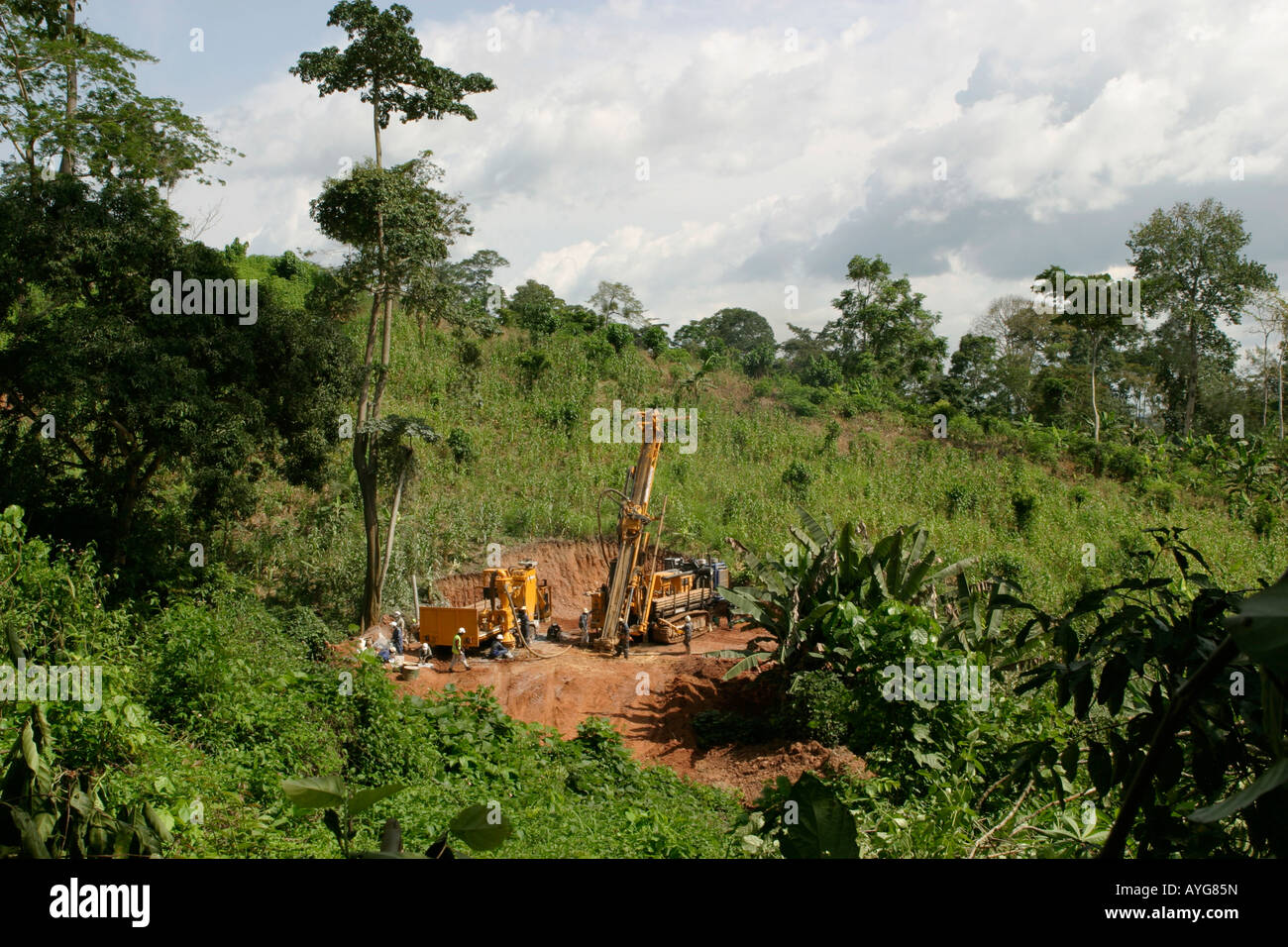 Exploration core drilling with RC drill rig fitted with dust ...