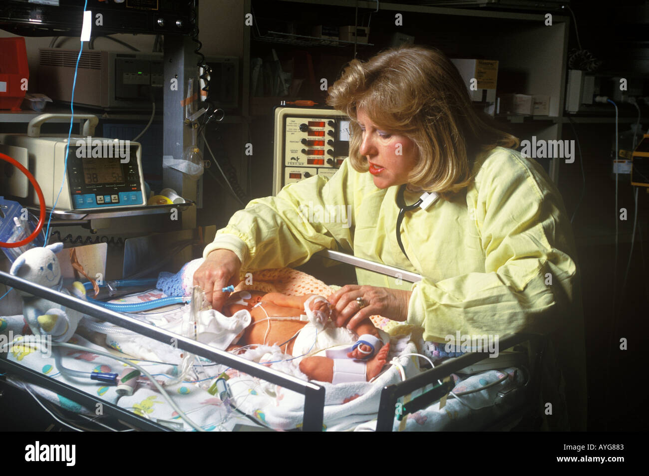Neonatologist in hospital neo natal intensive care unit Stock Photo - Alamy