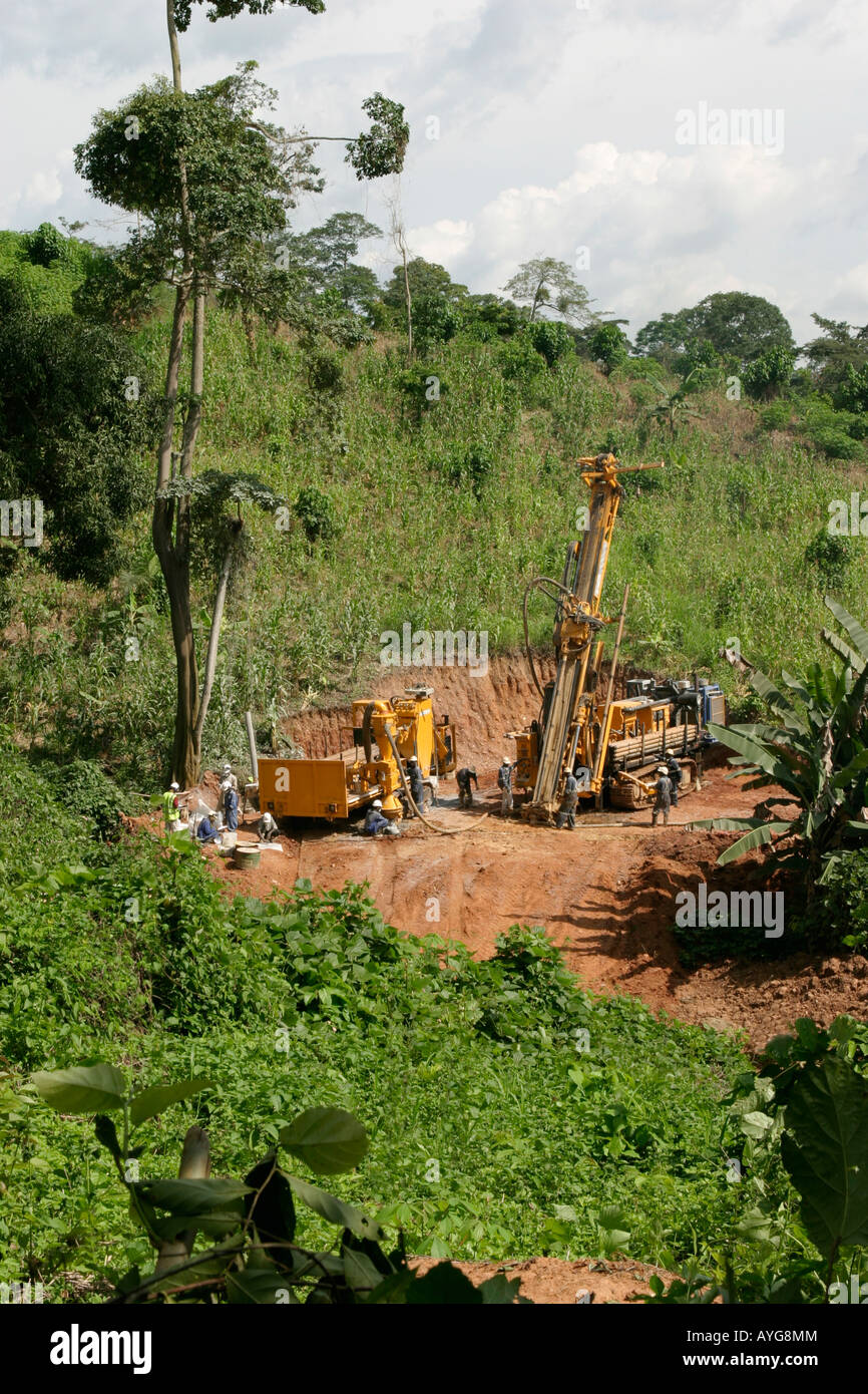 Exploration core drilling with RC drill rig fitted with dust ...