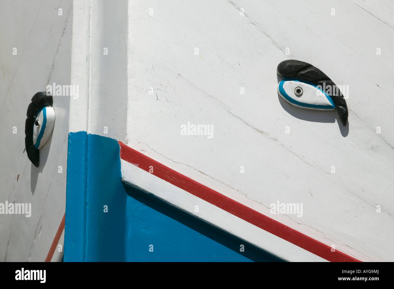 White Luzzu with traditional eyes in Malta Stock Photo - Alamy