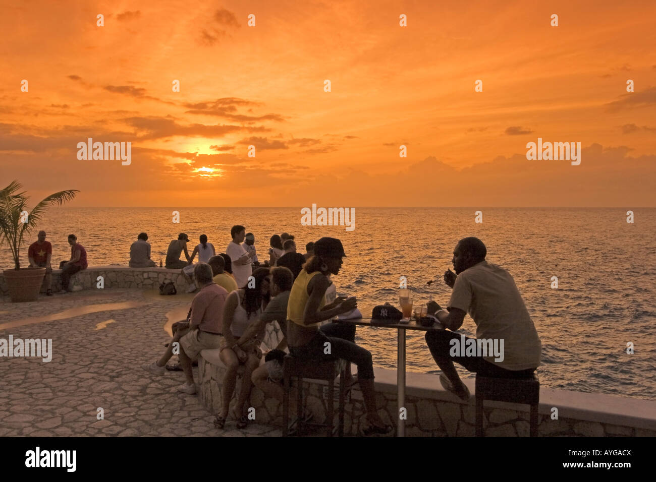 Jamaica Negril Ricks Cafe open air bar viewpoint at sunset Stock Photo ...