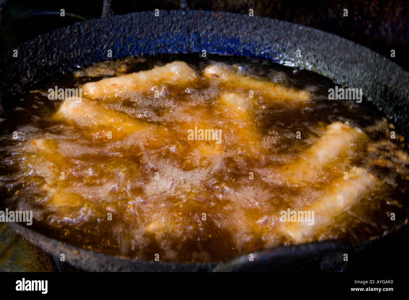 Vietnamese Springrolls or Nem Frying in Oil at Popular Dac Kim Hanoi ...