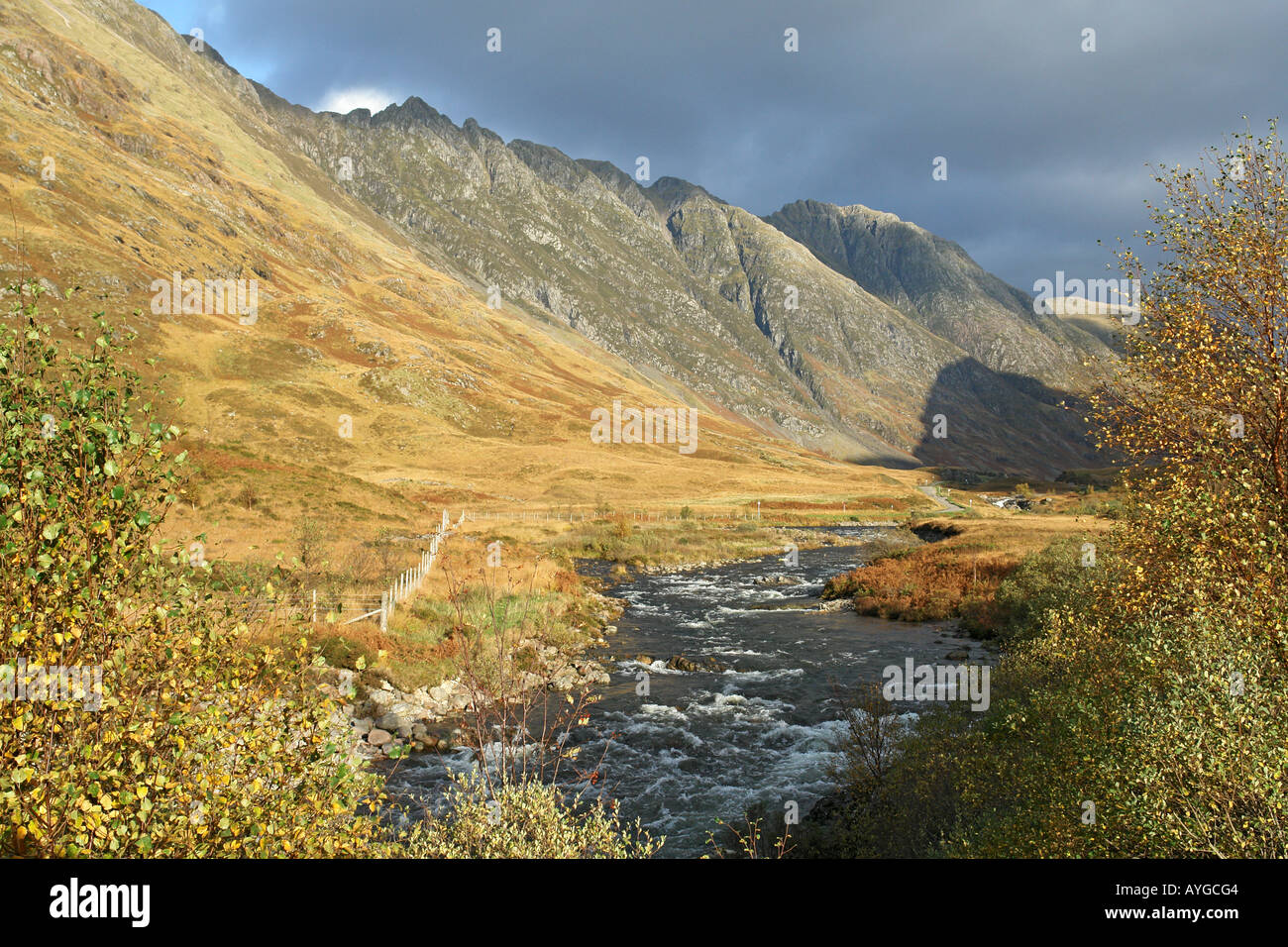 Spectacular view of River Coe rushing down Glen Coe Highland Scotland ...