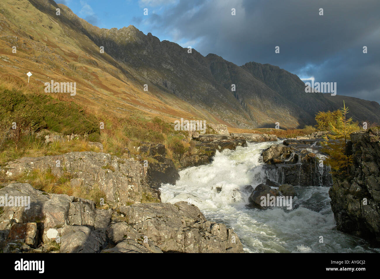 Spectacular view of River Coe rushing down Glen Coe Highland Scotland ...