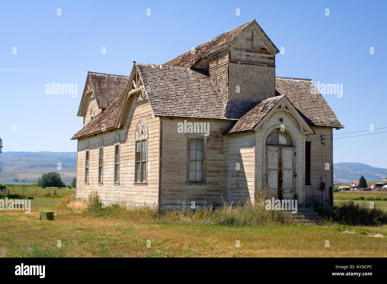 Old Americana wooden Mormon Church with a large grass lawn, Ovid, near ...