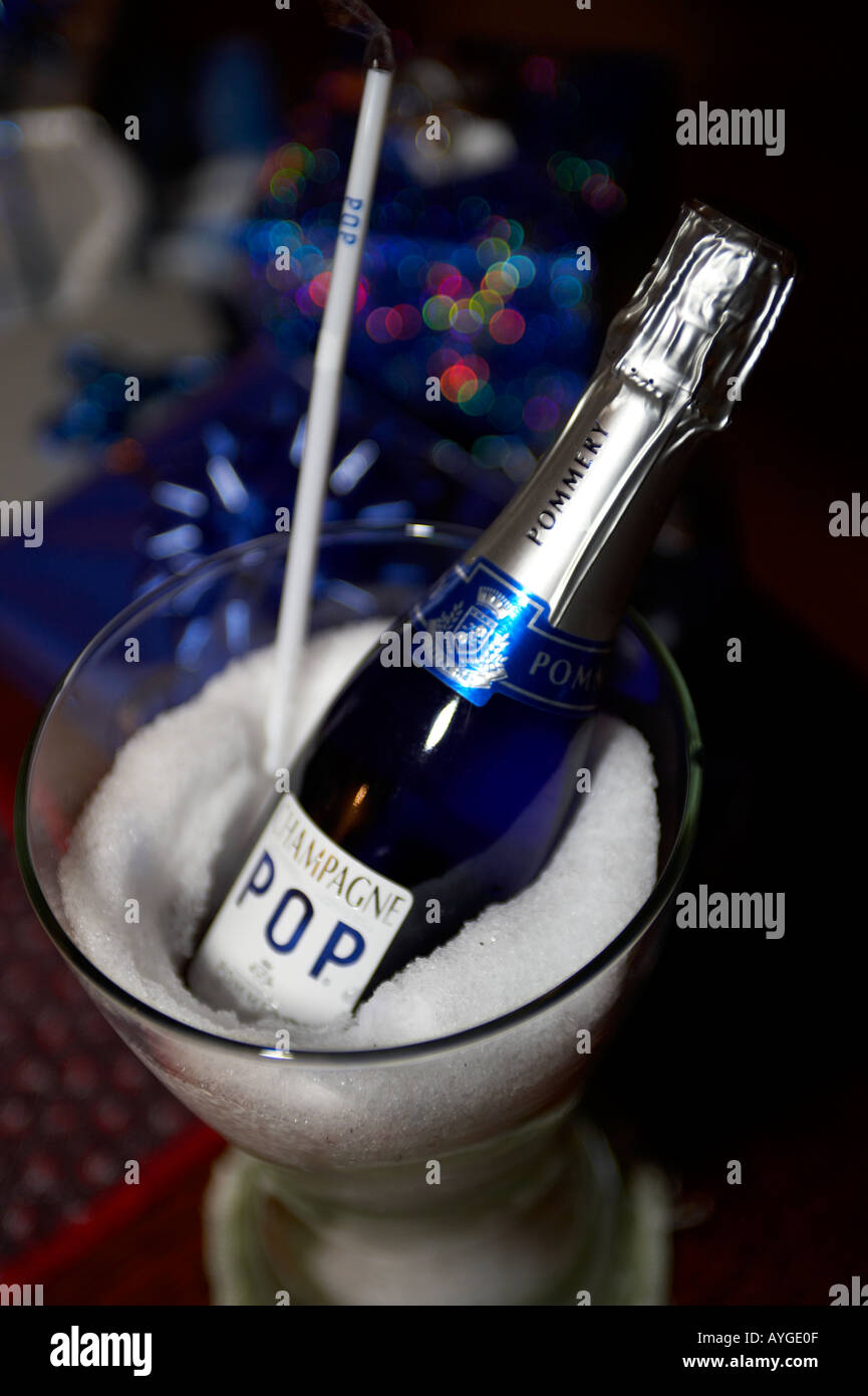 Small Champagne Bottle on ice Stock Photo - Alamy