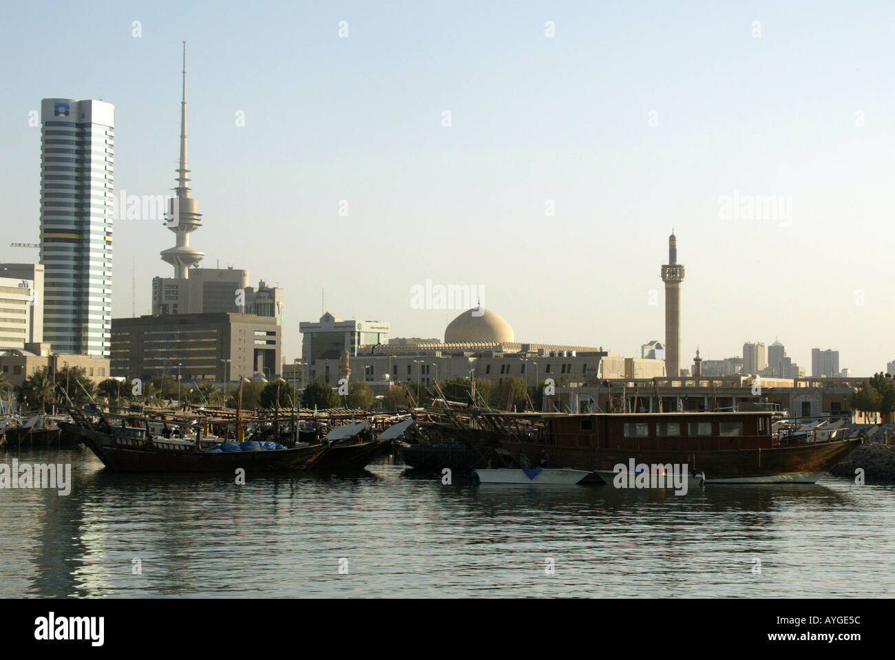 Ancient doha fishing boats along the waterfront of the Persian Gulf ...
