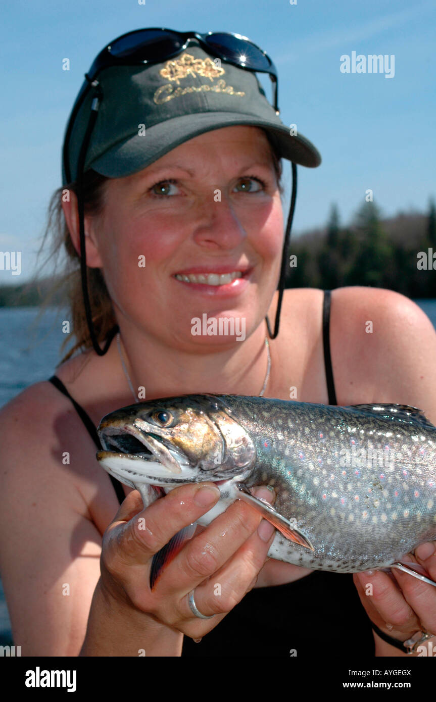 woman holding fish Stock Photo - Alamy