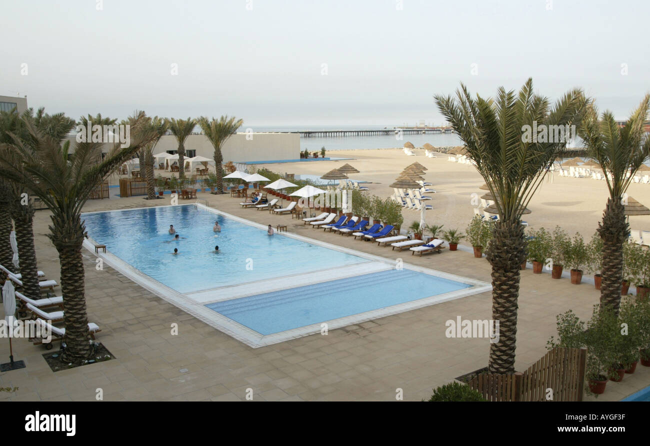 Swimming pool at the Hilton Resort along the Persian Gulf in Kuwait ...
