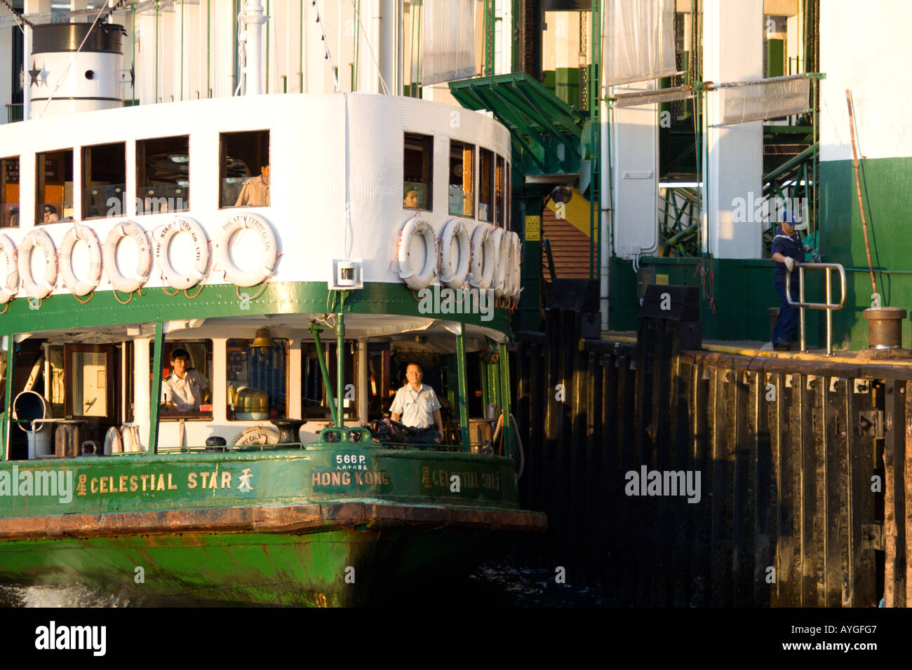 Star Ferry Loads and Unloads Passengers at the Terminal Pier TST Tsim ...