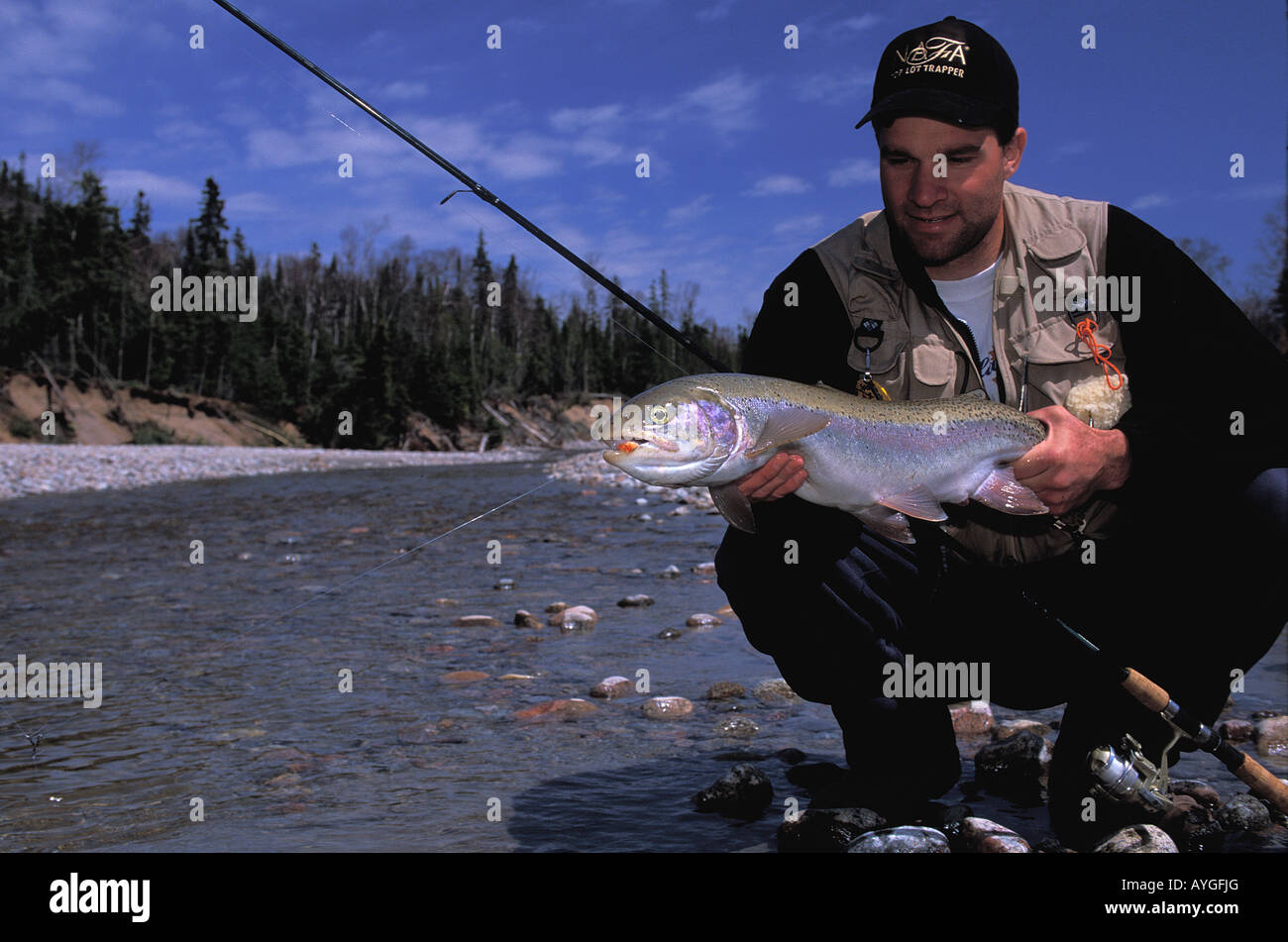 man holding large fish Stock Photo - Alamy