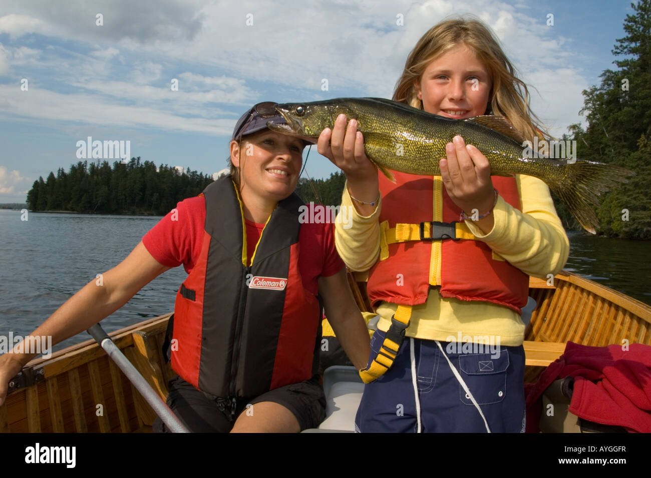 mother and daughter fishing walleye Stock Photo - Alamy