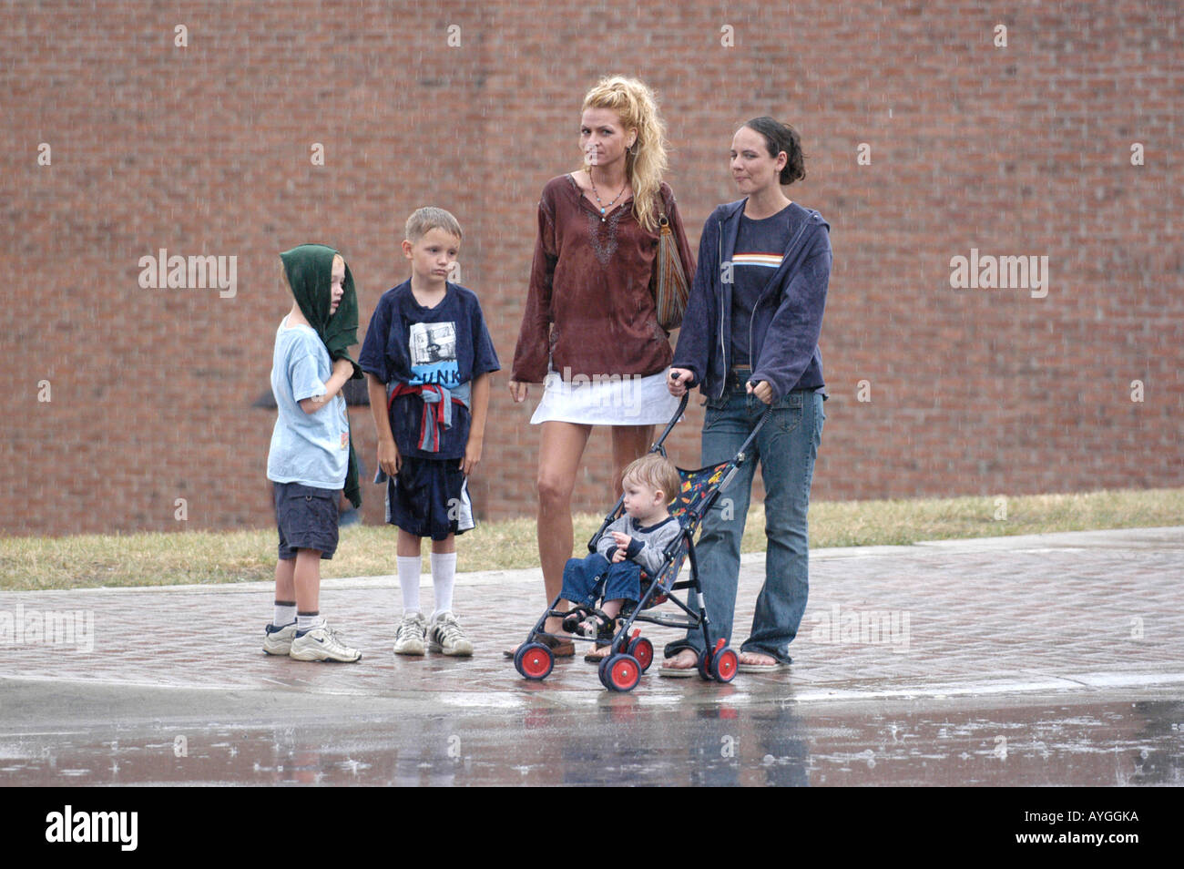 Pedestrian caught in rain storm on a public street Stock Photo - Alamy