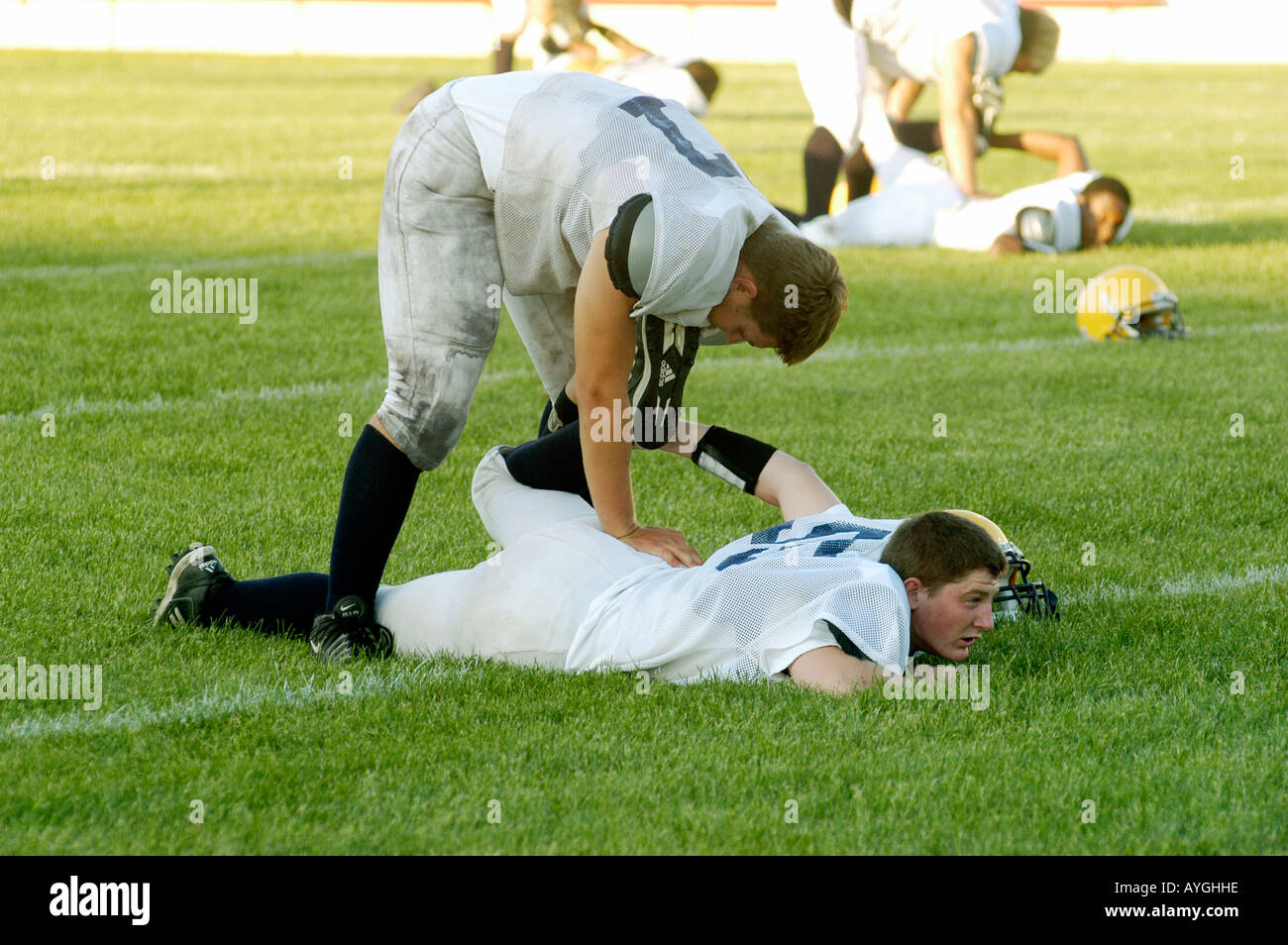 Football players warm up with exercises before playing in a game Stock ...
