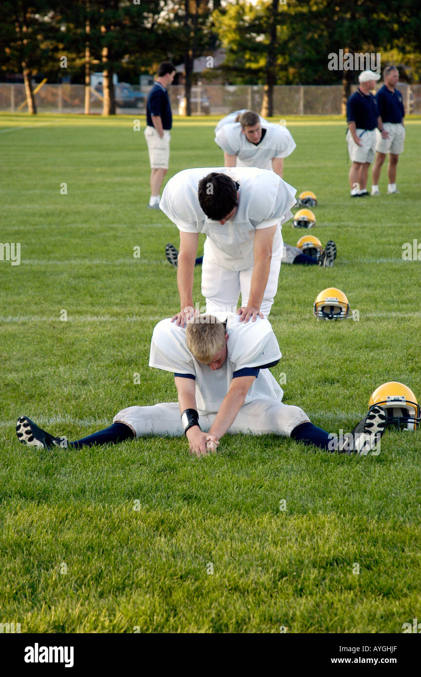Football players warm up with exercises before playing in a game Stock ...