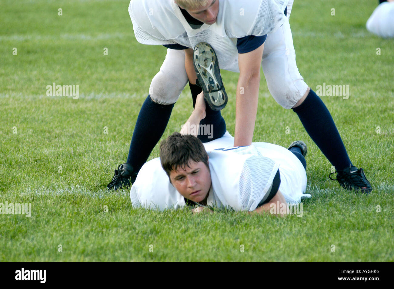 Football players warm up with exercises before playing in a game Stock ...