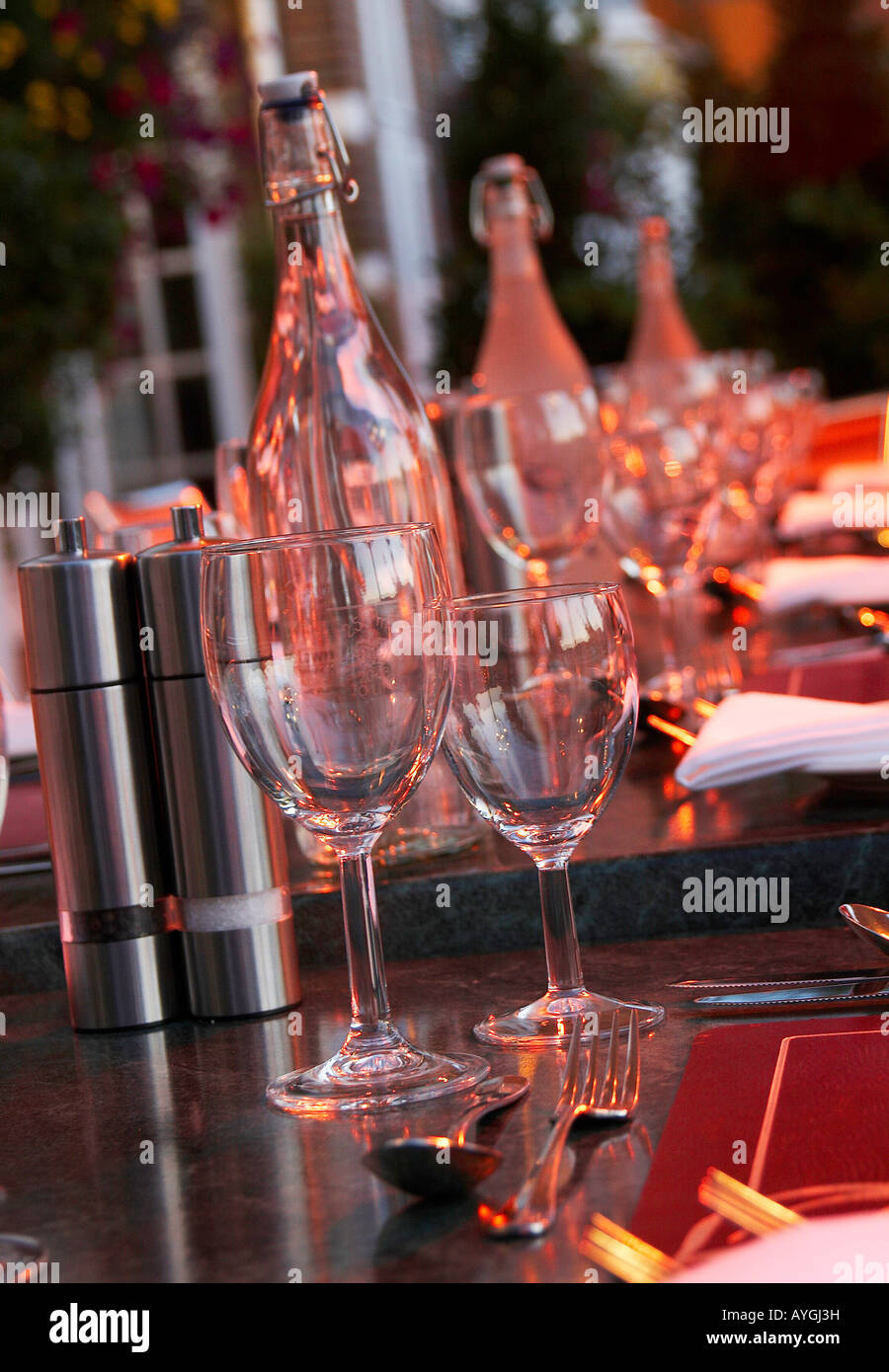 Table setting at sunset Stock Photo - Alamy