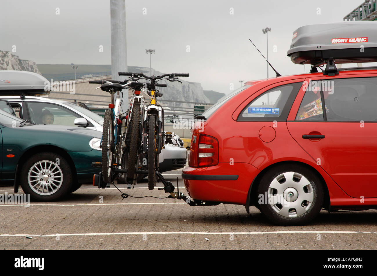 A car overloaded with bikes Stock Photo - Alamy