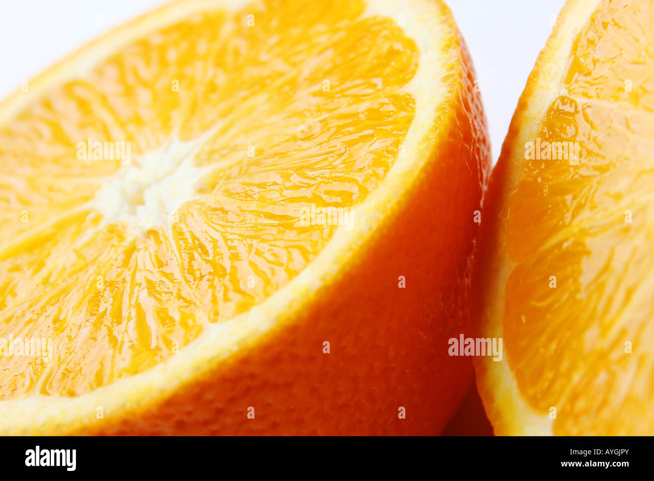 Close up of orange cut in half Stock Photo - Alamy