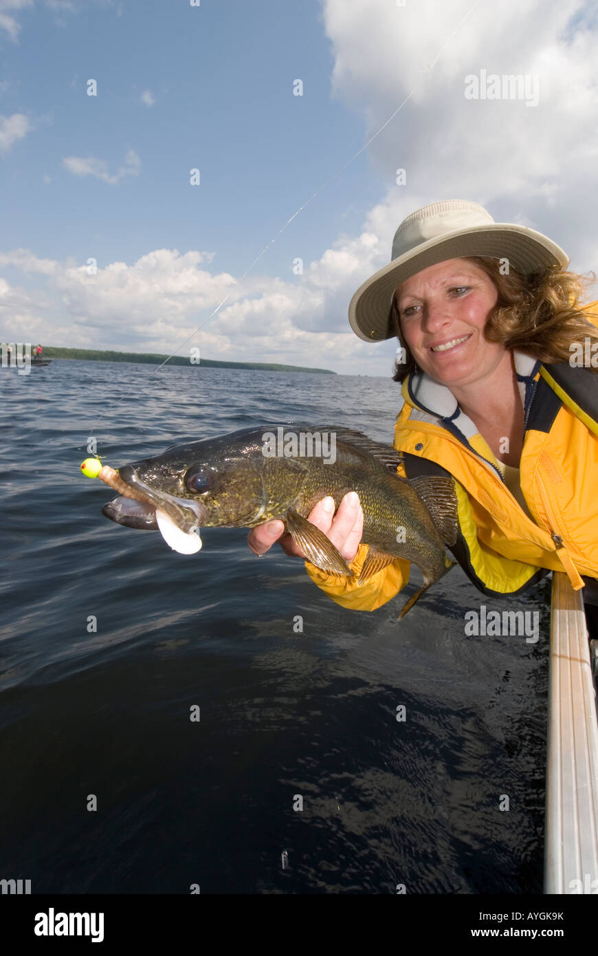woman holding walleye Stock Photo - Alamy