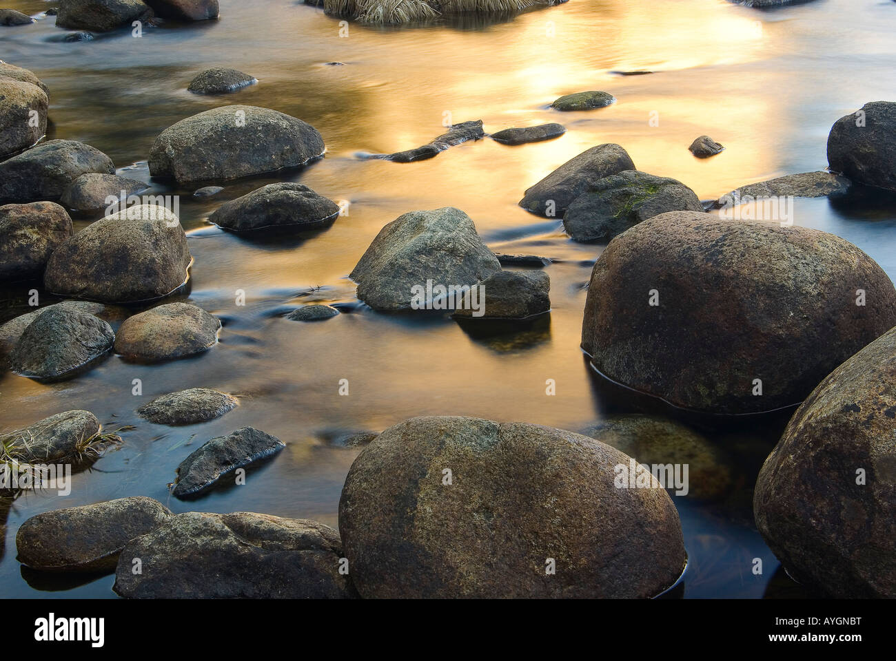 Rocks in water Stock Photo - Alamy