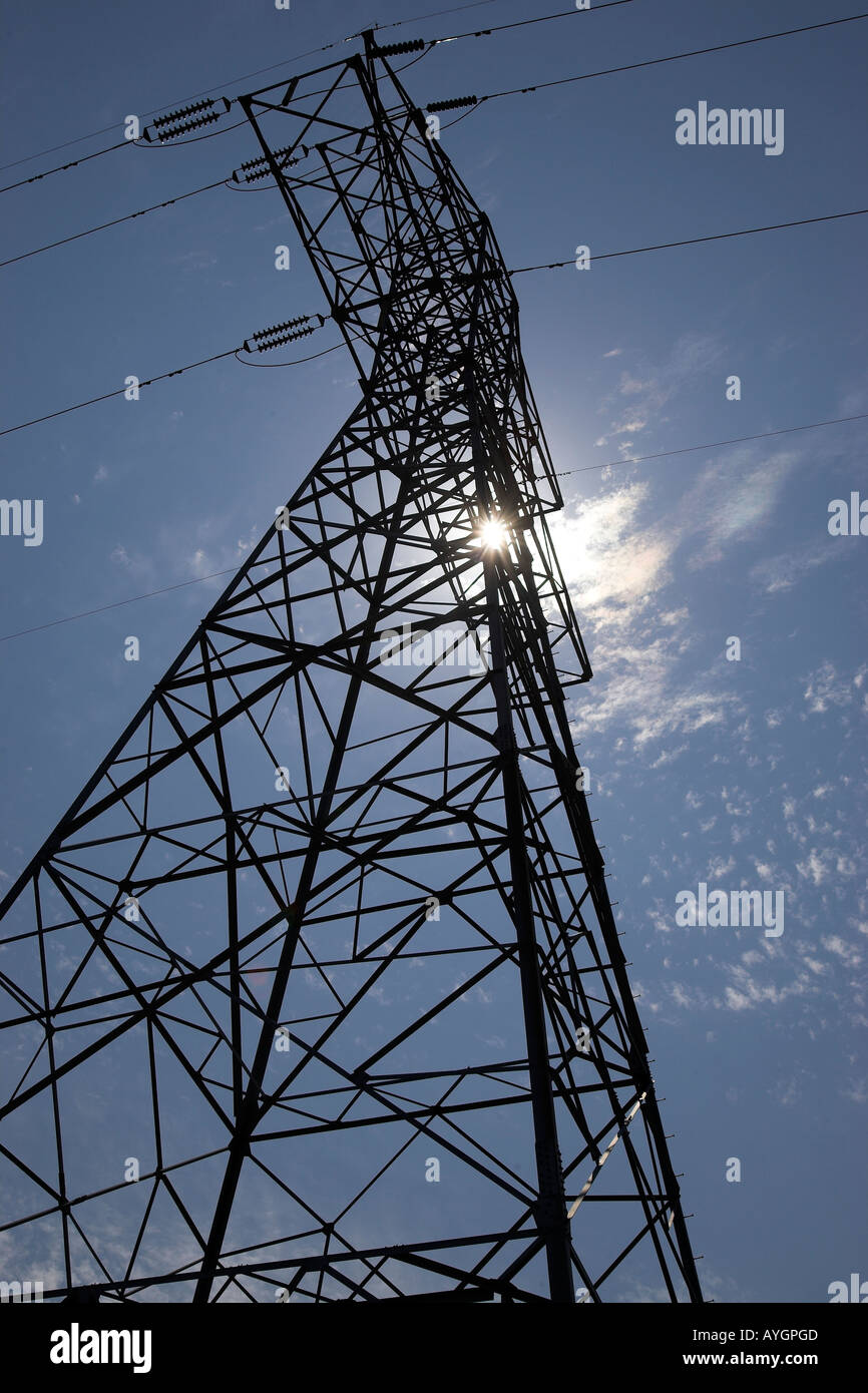Sun lights silhouette electricity pylon Winona Minnesota USA Stock ...