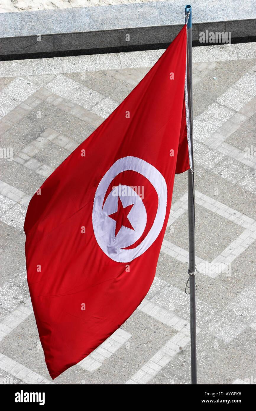 Red Tunisia national flag with red crescent and five point star on ...